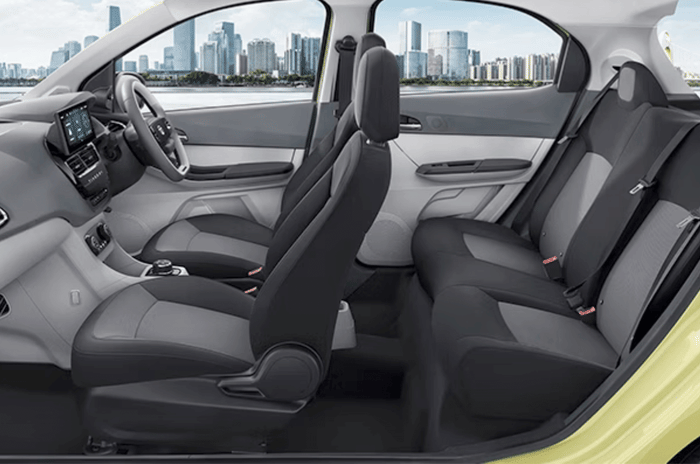 Tata Tiago EV Price, Range, Running Cost FAQs - Introduction | Autocar ...